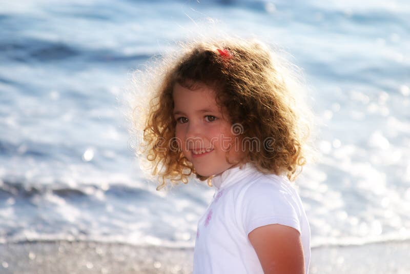 Little child at the beach stock photo. Image of portrait - 1019556