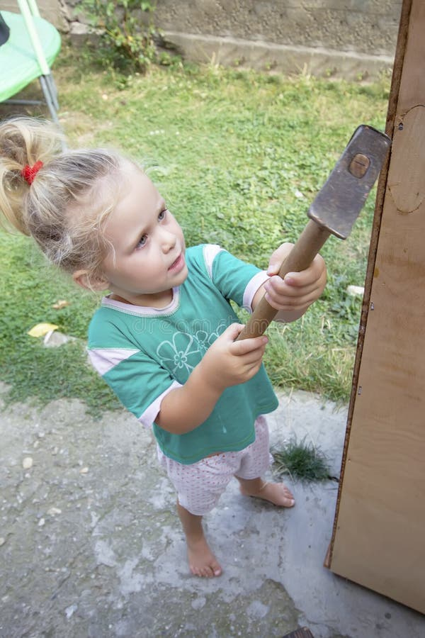 Little Child and Big Hammer Stock Photo - Image of helper, learning ...