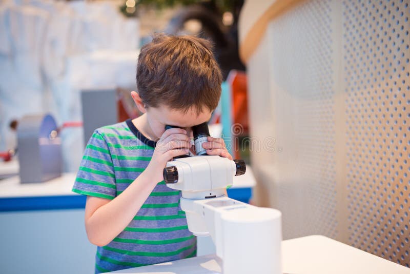 Boy Looking Microscope Stock Photos - Download 795 Royalty Free Photos