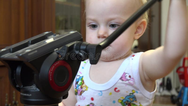Little Child Discovering Tripod. 4K UltraHD, UHD Stock Video - Video of ...