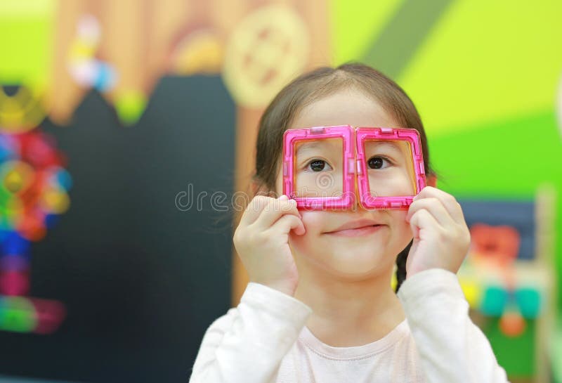 Little Child Girl Playing Magnets Toy for Brain Development Stock Photo ...