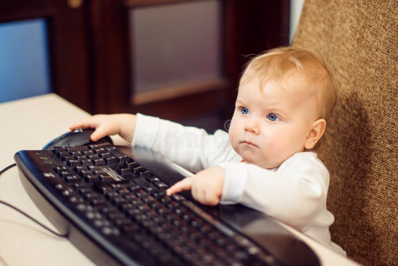 Little child with keyboard stock image. Image of childhood - 85371297