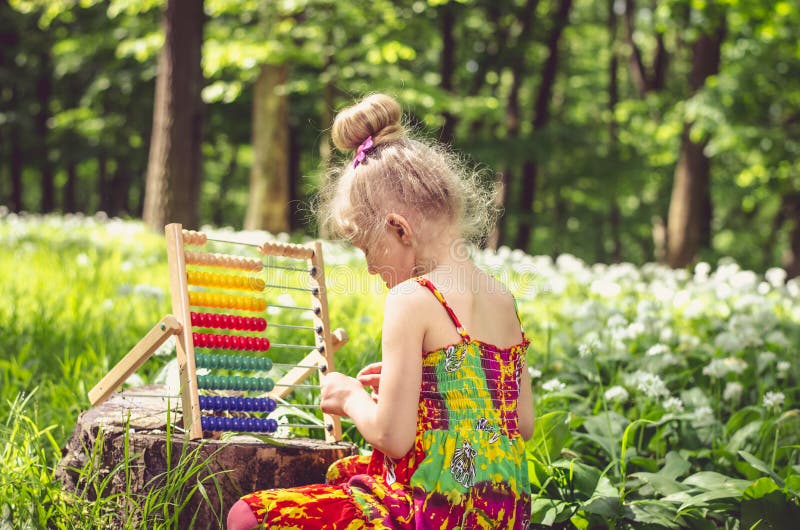 Little Child Learning Mathematics Stock Photo - Image of forest, learn ...