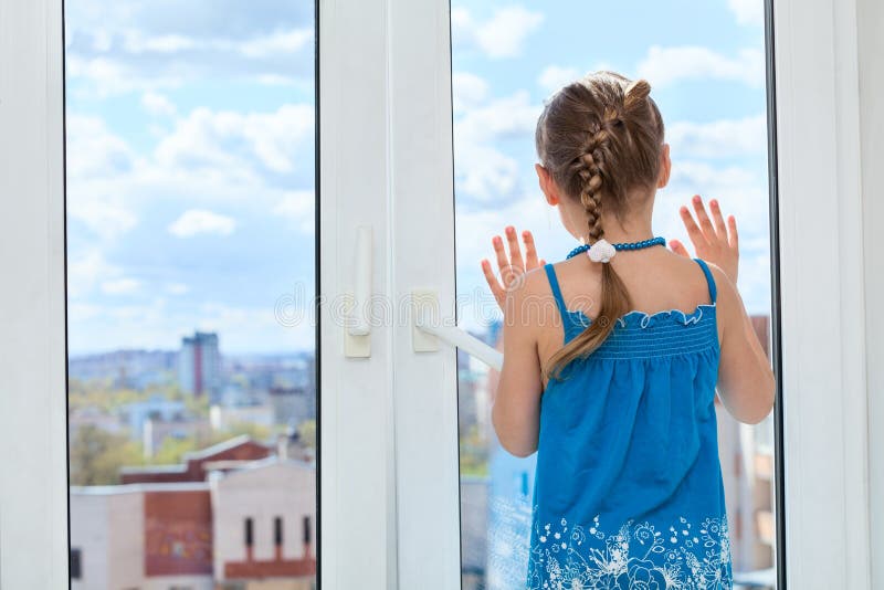 Little Child Looking through the Window Glass Stock Image - Image of ...