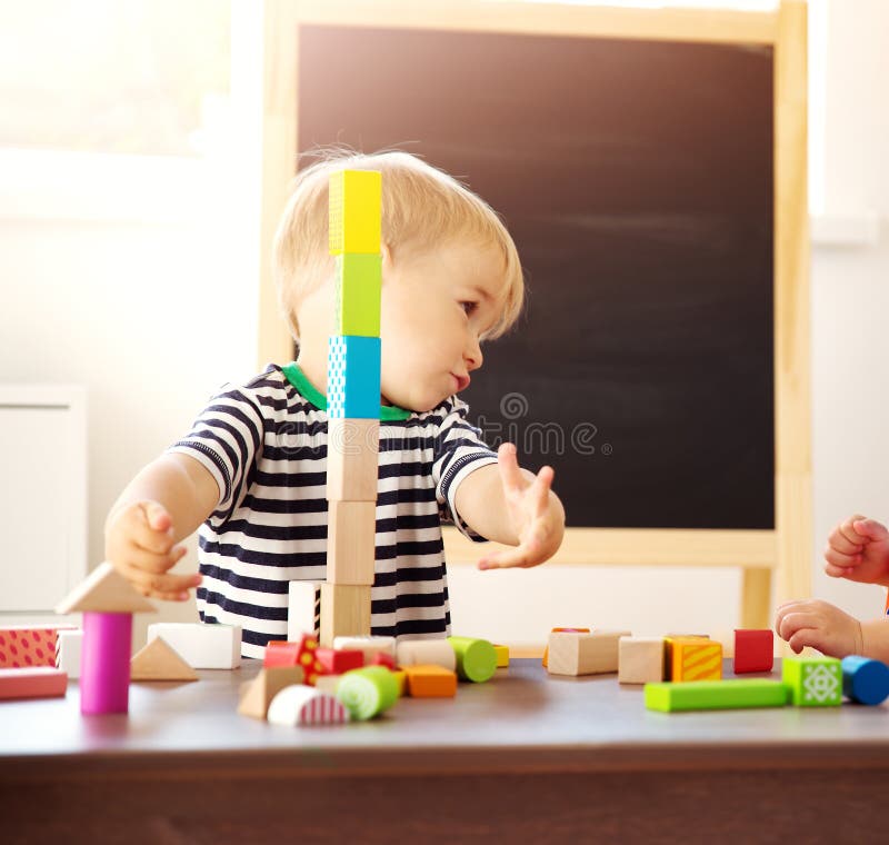 Little Child Playing with Blocks Stock Photo - Image of happy, innocent ...