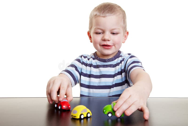 Little Child Playing with Cars Stock Image - Image of imagination, shot ...