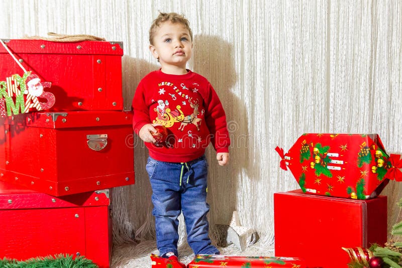 Little Child Playing with Christmas Decorations in Studio, Little Child ...