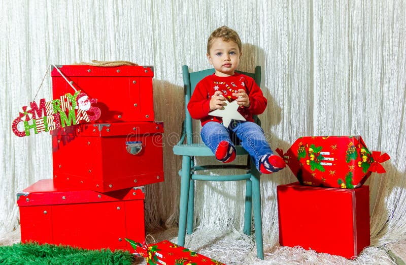 Little Child Playing with Christmas Decorations in Studio, Little Child ...