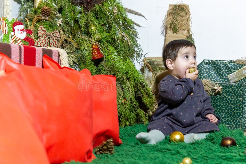 Little Child Playing with Christmas Decorations in Studio, Little Child ...