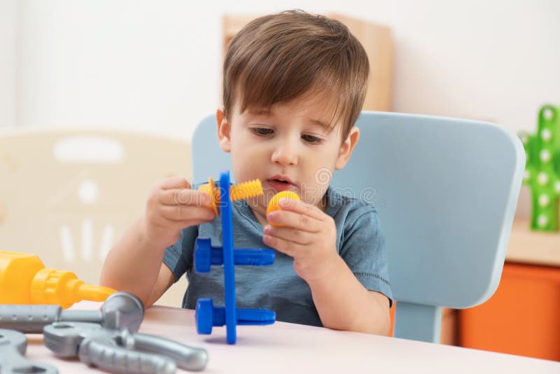 Little Child Playing with Toy Construction Tools Stock Photo - Image of ...