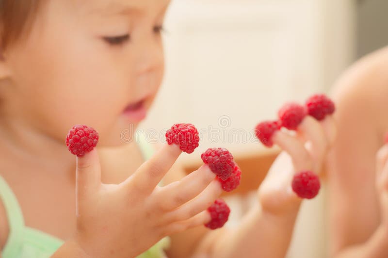 Little Child with Raspberry on Fingers Stock Photo - Image of fingers ...