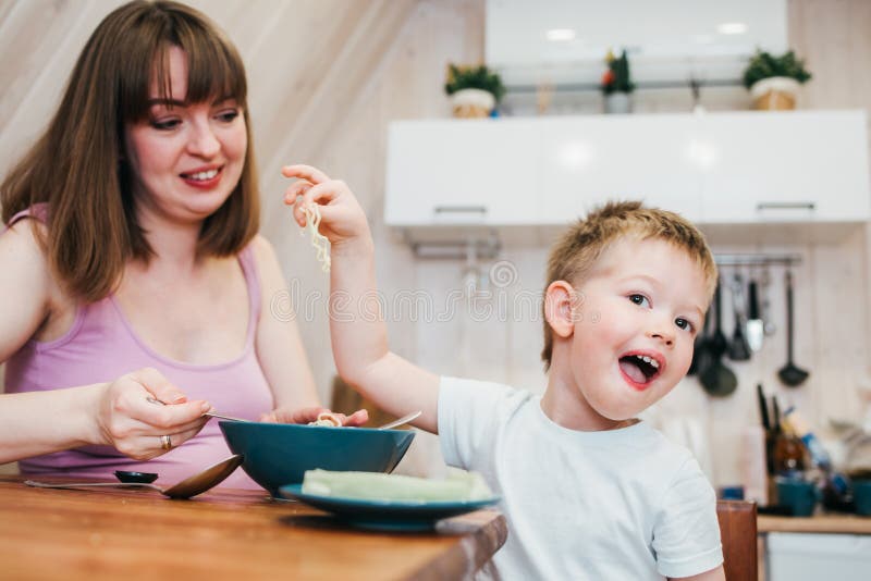 Little Child Refuses To Eat Pasta in the Kitchen Stock Image - Image of ...