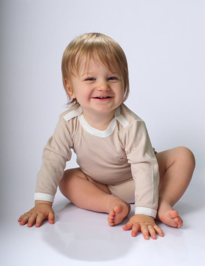 Little Child Sitting on the Floor Stock Image - Image of eyes, toddler ...