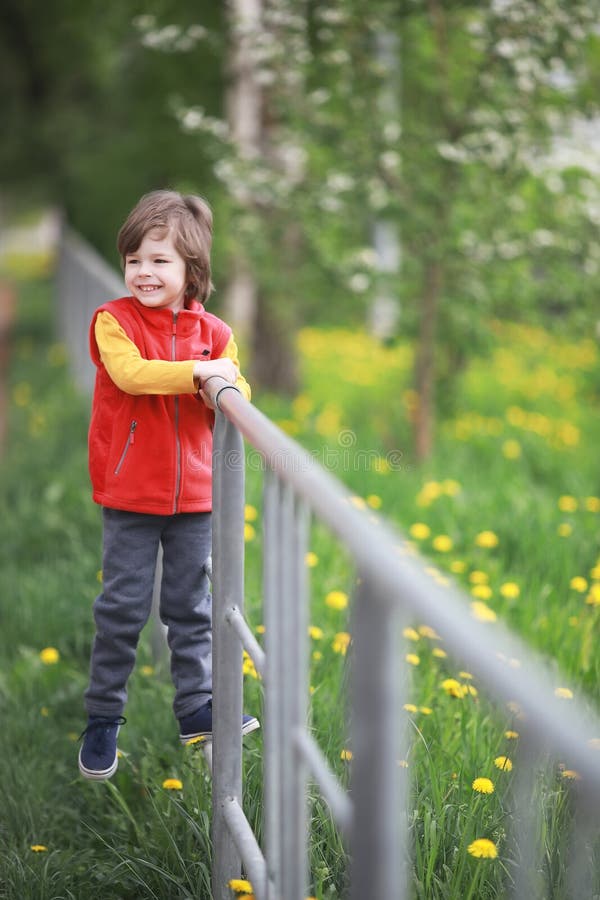 A Little Child on a Spring Day Walk Stock Image - Image of flower ...