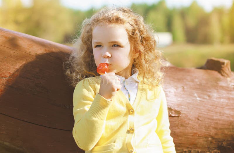 Little Child with Sweets Having Fun Stock Image - Image of fall, child ...