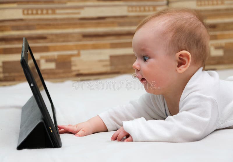 Little Child Touching His Tablet Computer Stock Image - Image of face ...