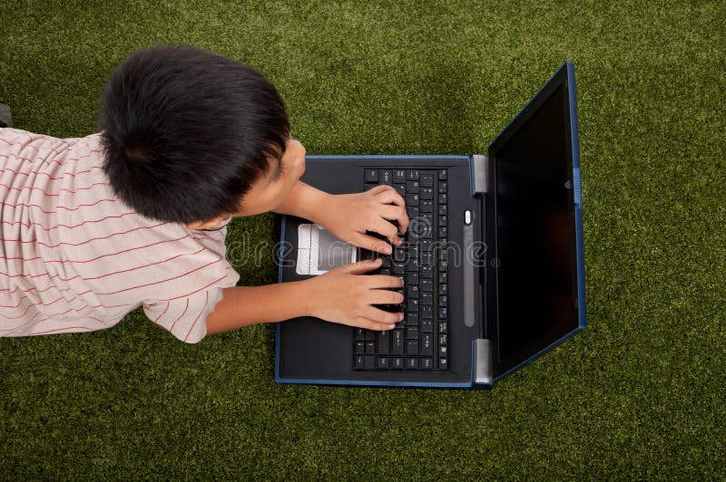 Little child using laptop stock photo. Image of hands - 4408122