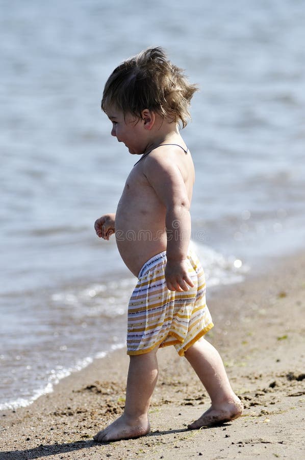 Little Child Wants To Enter into Water Stock Image - Image of person ... Little Child Wants To Enter into Water Stock Image - Image of person ...