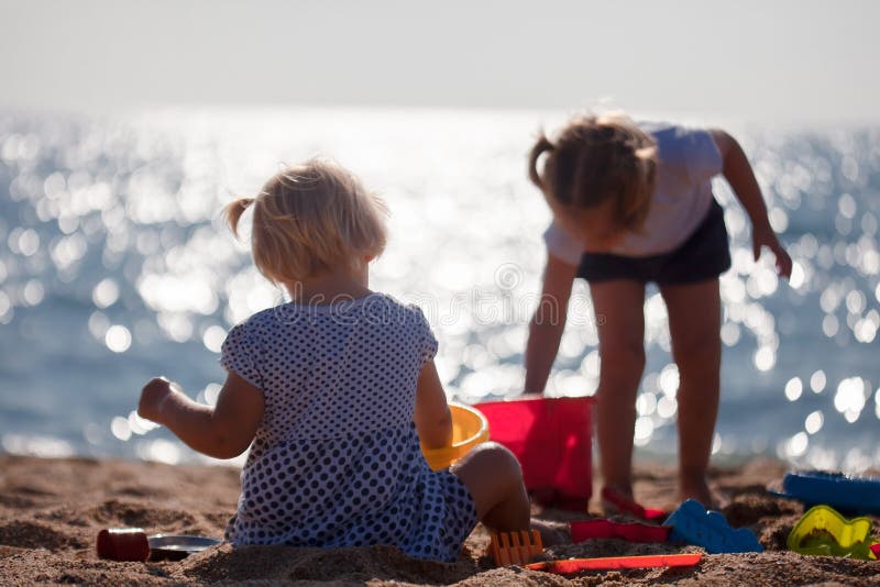 Little children on beach stock photo. Image of children - 48866972