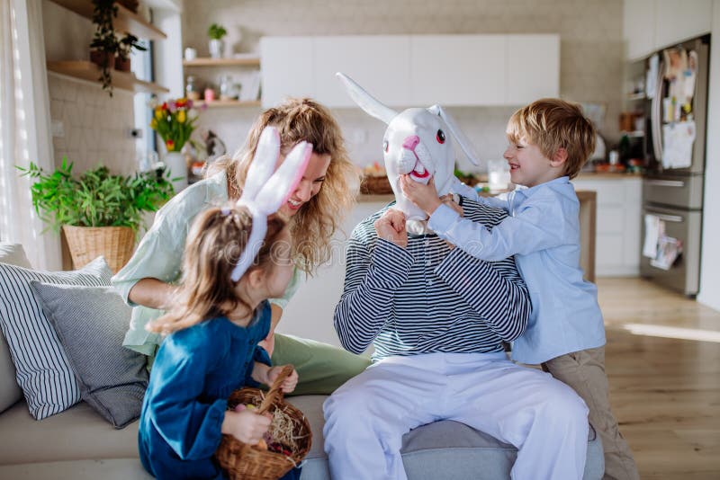 Little Children Having Fun with Her Mother and Easter Rabbit ...