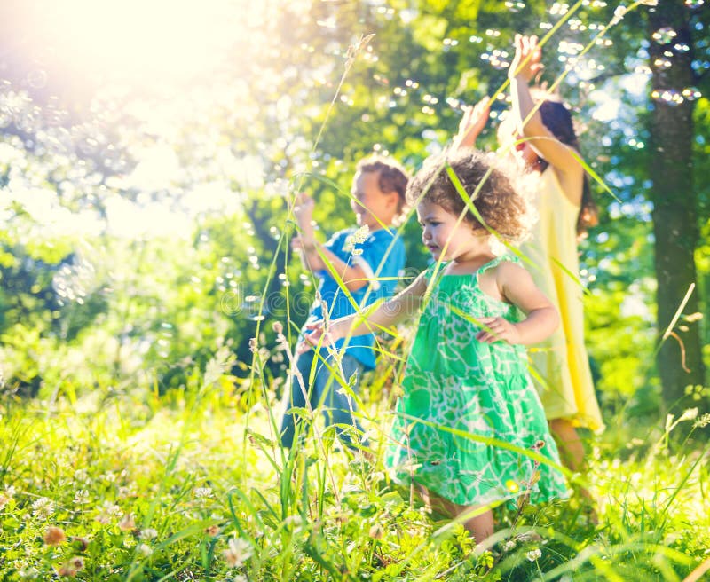 Little Children Playing Together Outdoors Stock Photo - Image of ...
