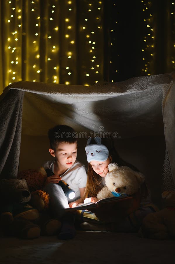 Little Children Reading Bedtime Story at Home Stock Photo - Image of ...