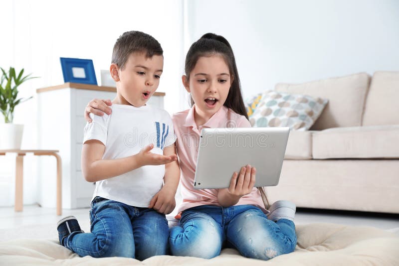 Little Children Using Video Chat on Table Stock Photo - Image of ...