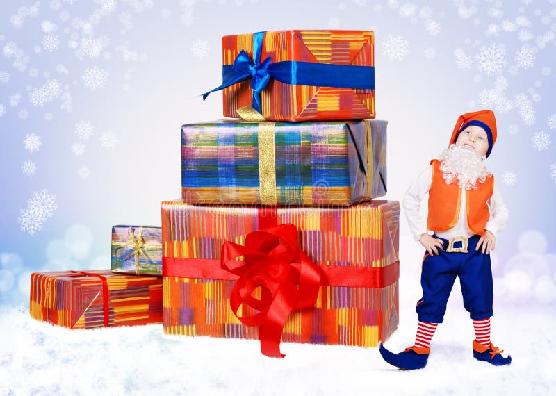 Little Christmas Elf with Big Gift Boxes Stock Image - Image of blue ...