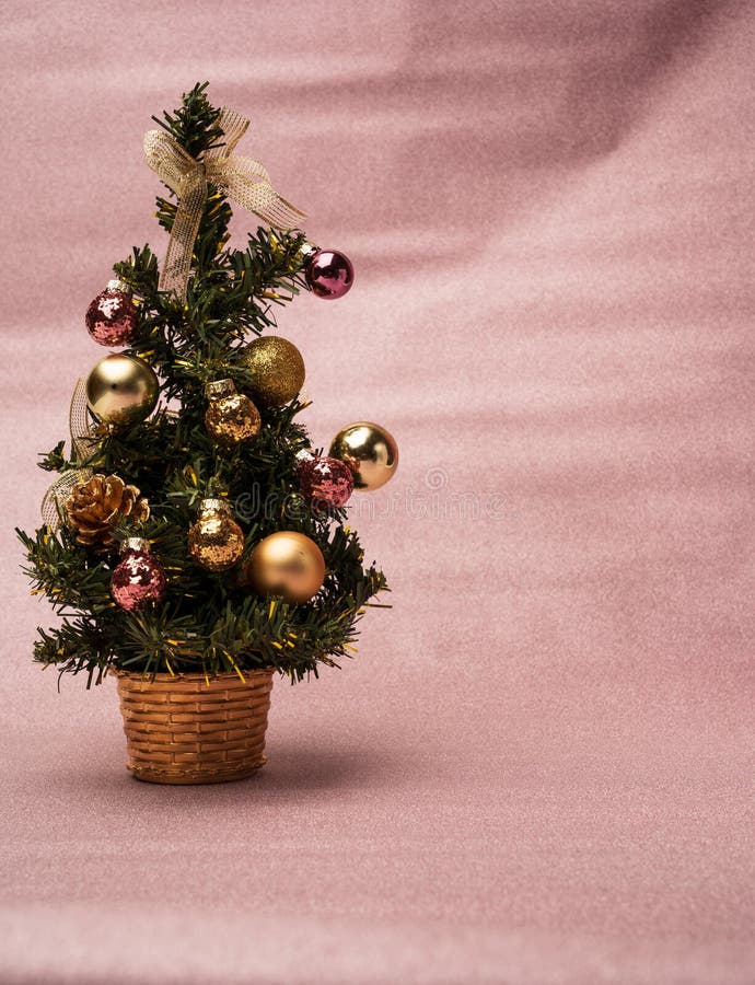 Little Christmas Tree on a Pink Background , with Blank Space To Write ...