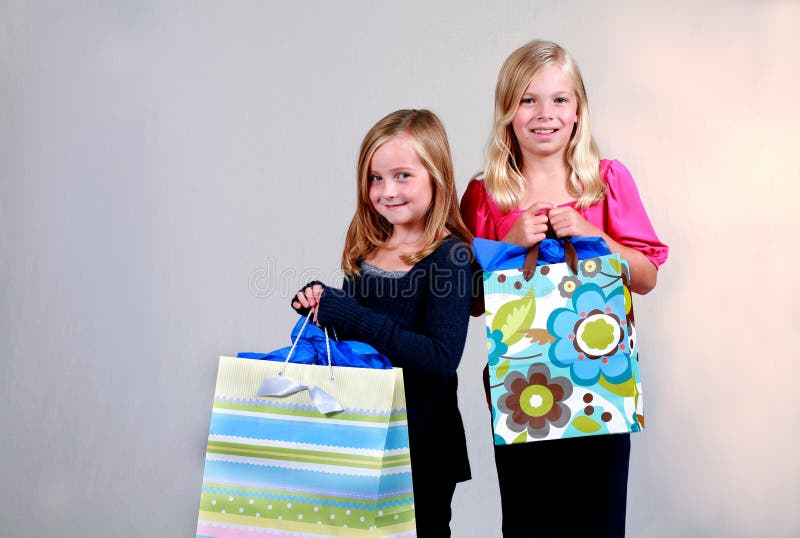 Little Consumers stock photo. Image of gifts, girls, commerical - 6691850