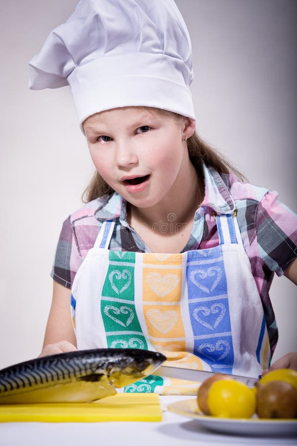 Little cook stock photo. Image of kids, girl, fish, people - 19744186