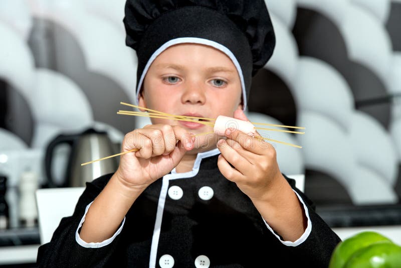 Little Cook.Boy Prepare Spaghetti in Kitchen. Stock Photo - Image of ...