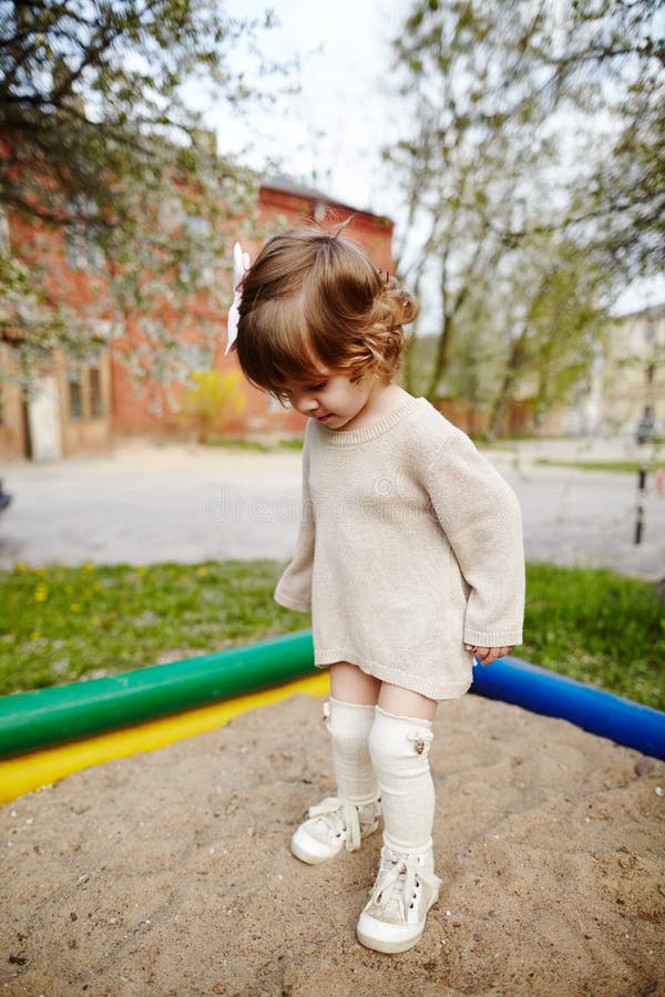 Little boy digging a hole stock image. Image of garden - 58069519