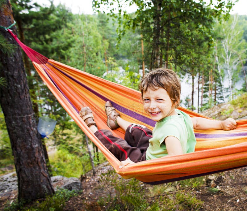 Little Cute Boy in Hammock Smiling Stock Photo - Image of person ...