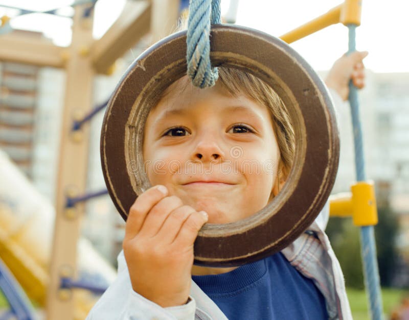 Little Cute Boy Hanging on Gymnastic Ring Stock Image - Image of blue ...