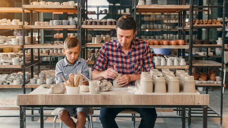 Little Cute Boy with His Father Making Ceramic Pots in the Pottery ...