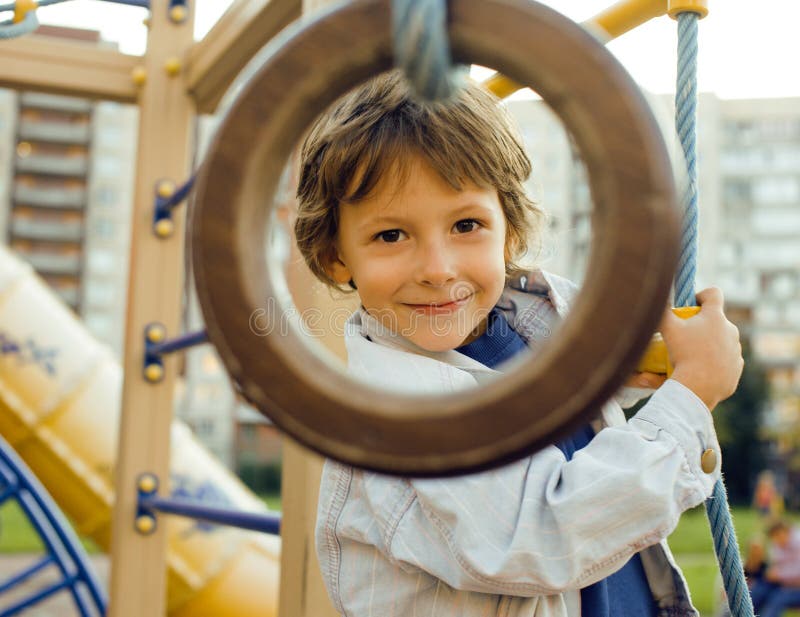 Little Cute Boy on Playground Outside Stock Image - Image of american ...