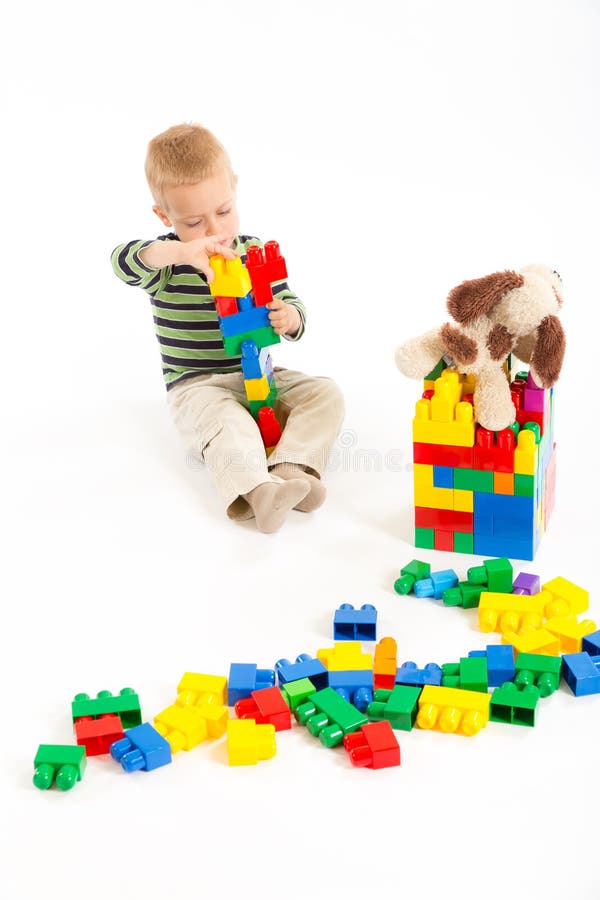 Little Cute Boy Playing with Building Blocks. Isolated on White. Stock ...