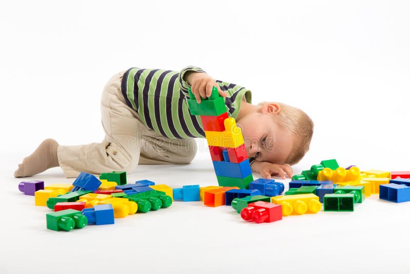 Little Cute Boy Playing with Building Blocks. Isolated on White. Stock ...