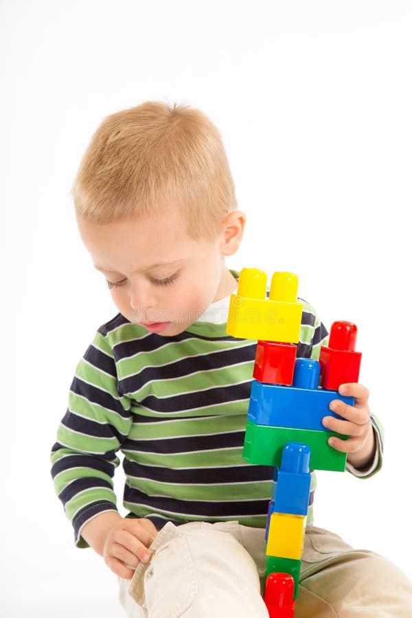 Little Cute Boy Playing with Building Blocks. Isolated on White. Stock ...