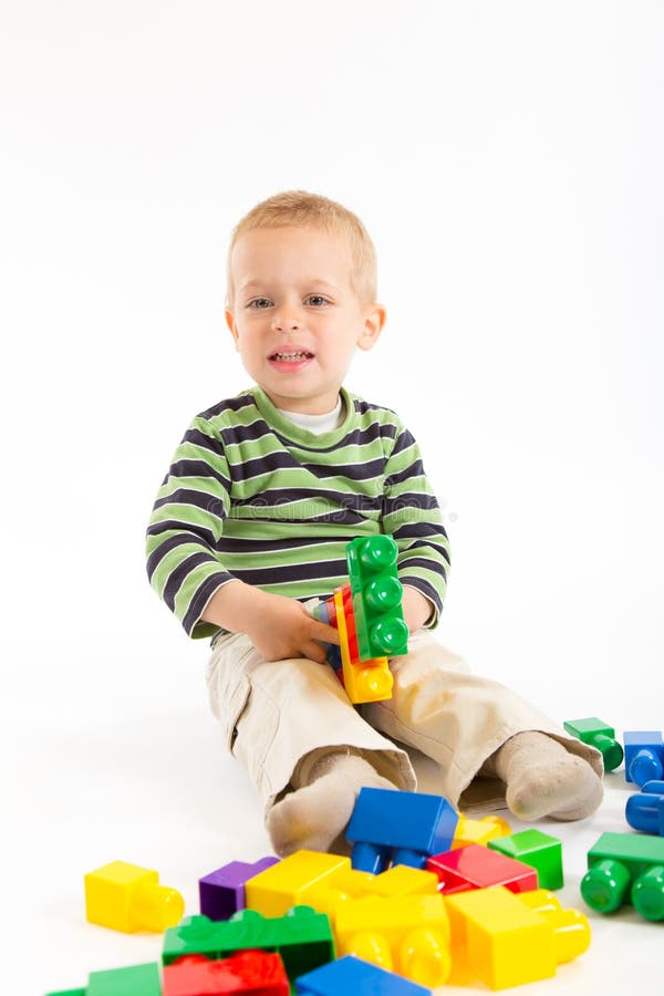 Little Cute Boy Playing with Building Blocks. Isolated on White. Stock ...