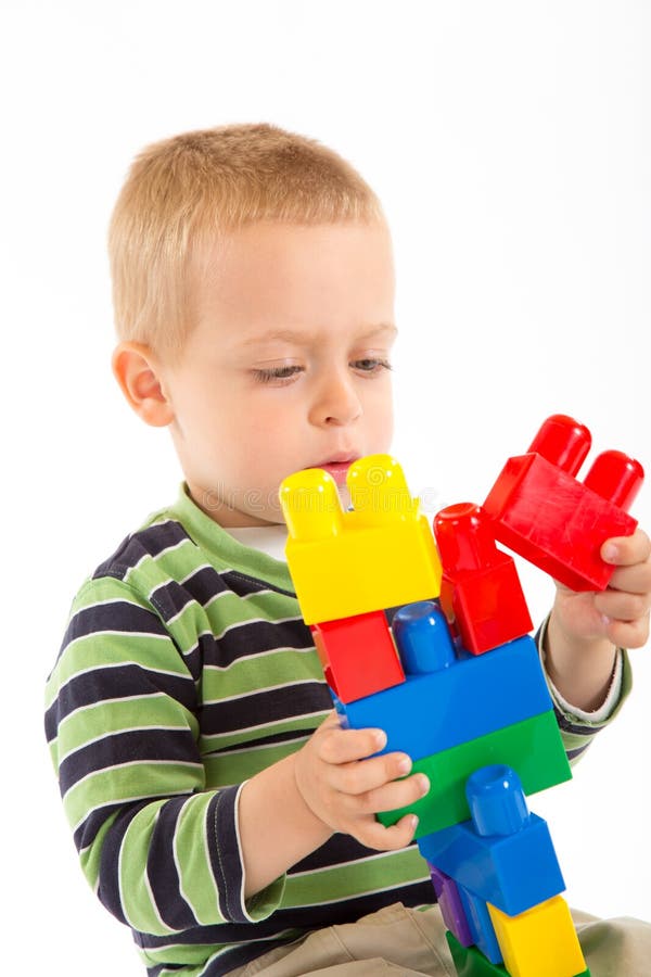 Little Cute Boy Playing with Building Blocks. Isolated on White. Stock ...