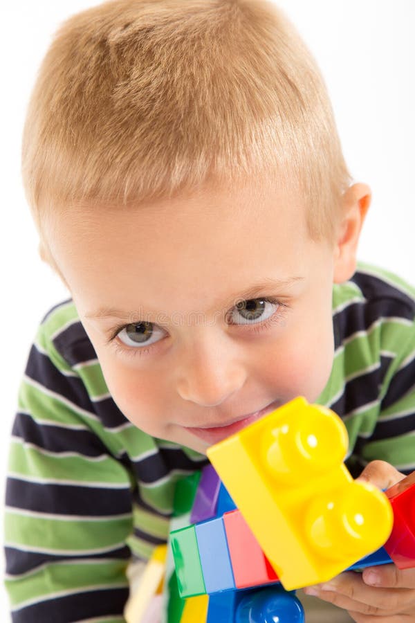 Little Cute Boy Playing with Building Blocks. Isolated on White. Stock ...