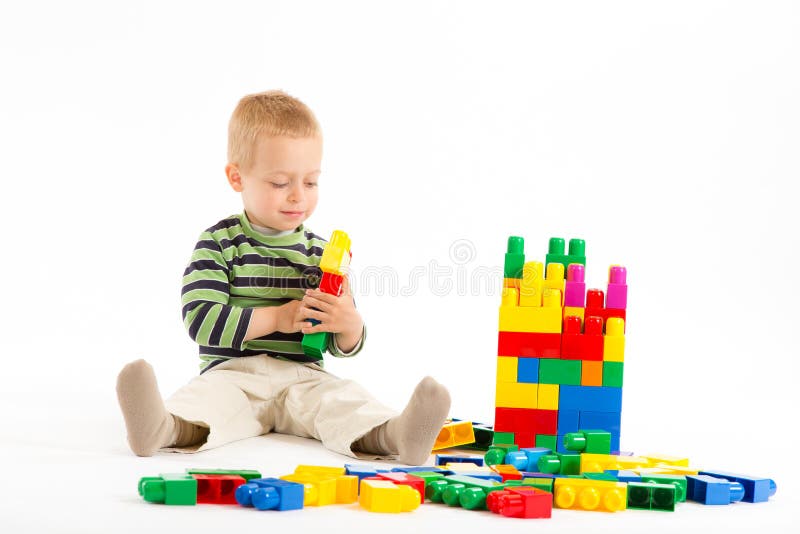 Little Cute Boy Playing with Building Blocks. Isolated on White. Stock ...