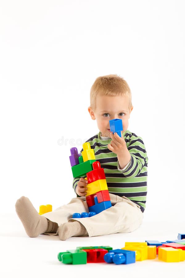 Little Cute Boy Playing with Building Blocks. Isolated on White. Stock ...