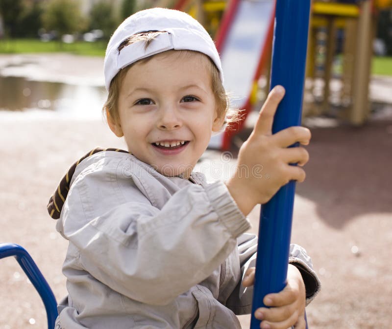 Little Cute Boy Playing Outside Stock Image - Image of people, cheerful ...