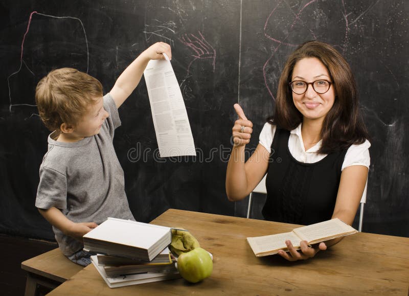 Little Cute Boy with Teacher in Classroom Stock Photo - Image of ...