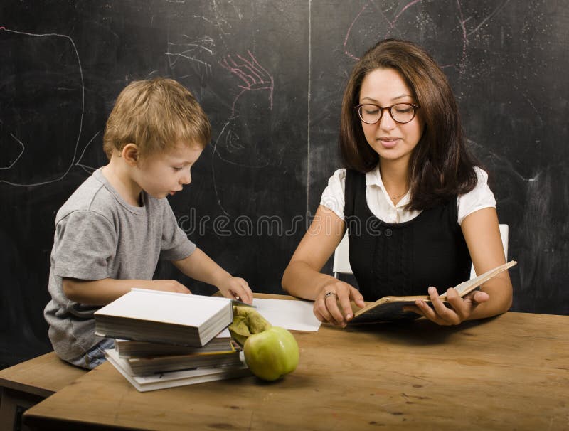 Little Cute Boy with Teacher in Classroom Stock Image - Image of ...