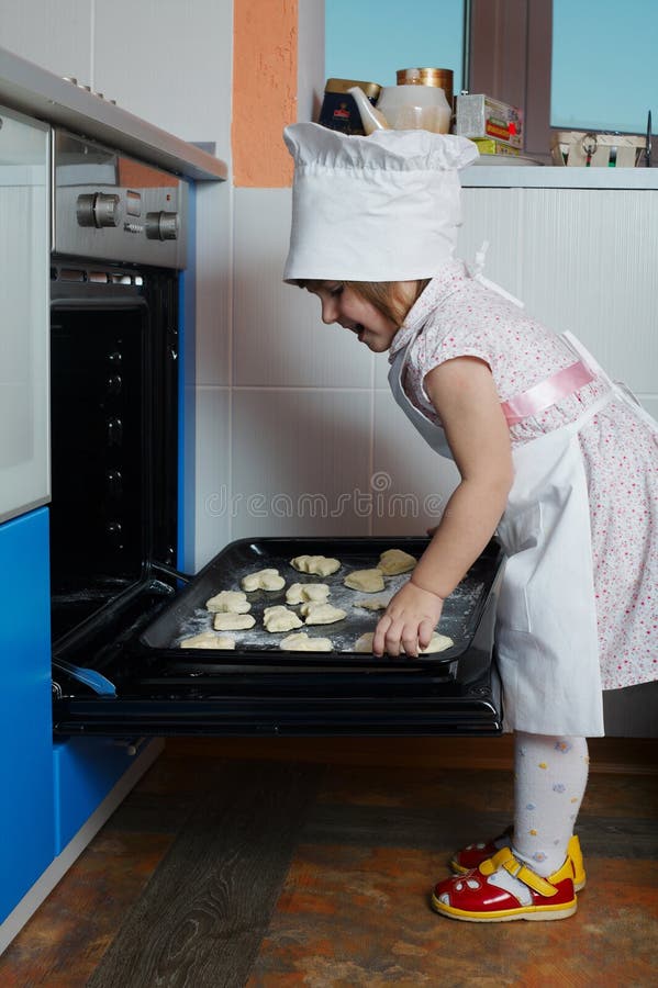 Little Cute Chef Cooking in the Oven Stock Image - Image of childhood ...
