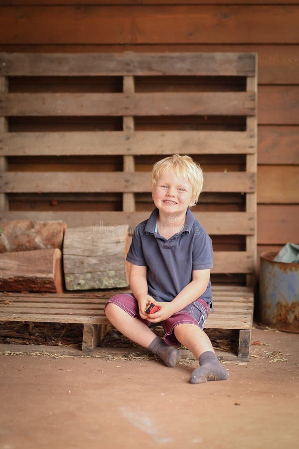 Little Cute Country Boy Posing on Porch Stock Image - Image of cheerful ...